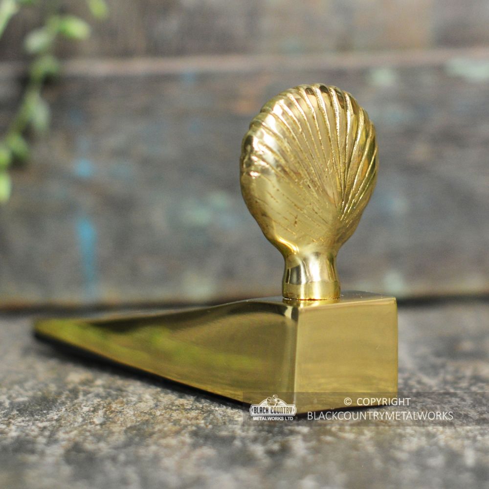 Polished Brass Shell Design Door Wedge | Black Country Metalworks