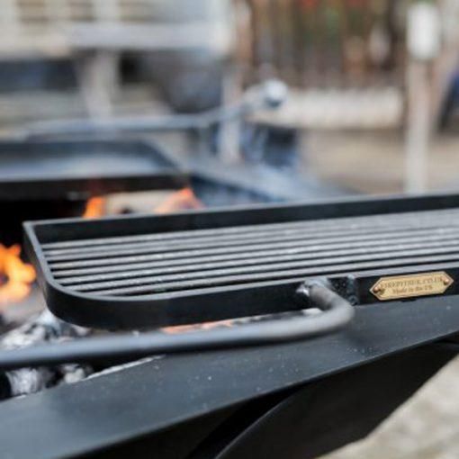 Simple Square Barbecue Fire Pit With Two Swing Arm Barbecue Racks ...