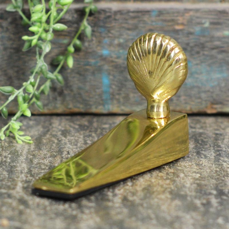 Polished Brass Shell Design Door Wedge | Black Country Metalworks
